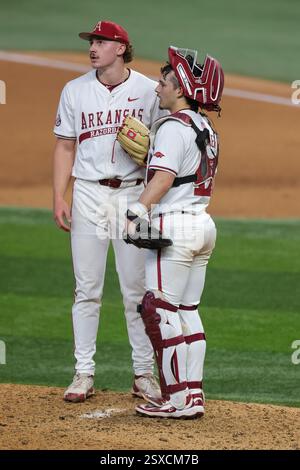 February 23, 2025: Razorback catcher Ryder Helfrick (27) looks up ...
