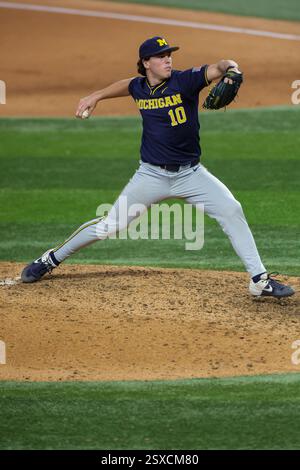 February 23, 2025: Tate Carey (10) of Michigan in action on the mound ...
