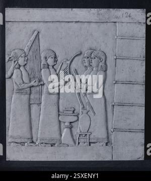 A cast of relief depicting musicians from the Assyrian period, based on ...