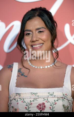 MIAMI, FLORIDA - FEBRUARY 22: Valentina Bueno (C) attends Karol G's Con ...