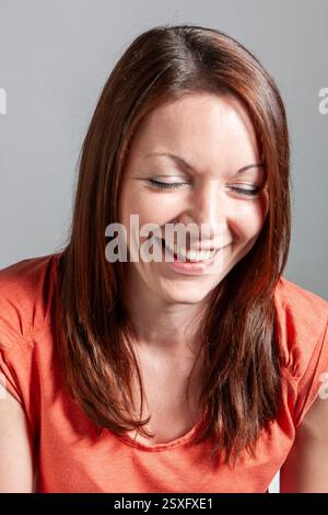 From a series of expressive portrait images of a young female model ...