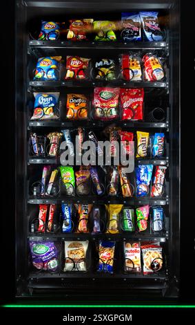 Snack vending machine / snack dispenser selling colourful sweets and ...