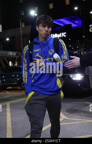 Ao Tanaka of Leeds United arrives ahead of during the Premier League ...