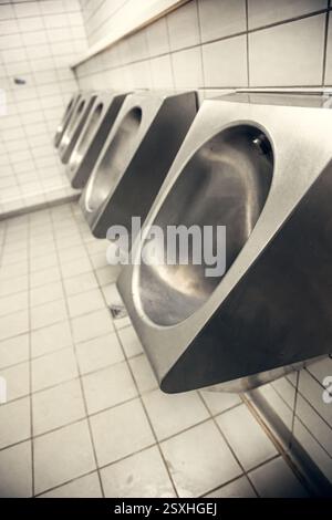 Interior of Public Restroom with Stainless Steel Fixtures and ...