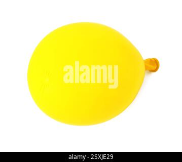 One yellow half deflated balloon isolated on white Stock Photo - Alamy