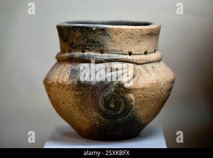 Photo shows pottery objects dating back to the Jomon era (14000-300 BCE ...