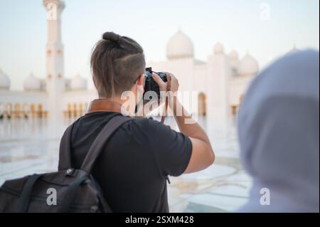 Man photographing the magnificent Sheikh Zayed Grand Mosque in Abu ...