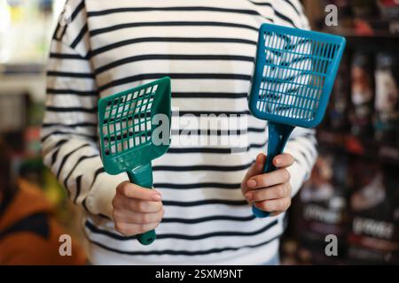 Green Cat Litter with Scoop in Litter Box Stock Photo - Alamy