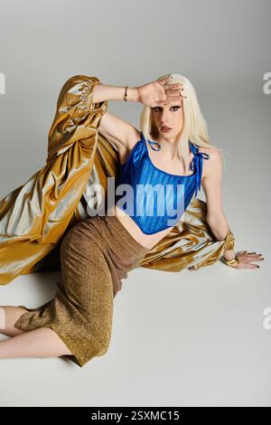 A fierce drag queen poses dramatically under falling confetti ...