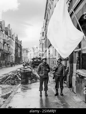 Cologne, Germany 1945 American troops escort injured captured German ...