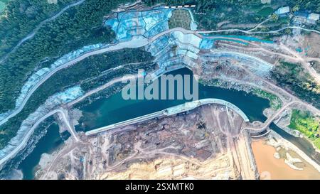Workers work at the construction site of Qingyukou Reservoir in ...