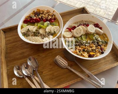 Fresh cooked oatmeal with fruits, close up Stock Photo - Alamy