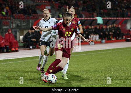 Germany's Jule Brand claims the ball after it hit Denmark's Emma Snerle ...