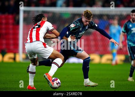 Stoke City's Ashley Phillips (left) and goalkeeper Jack Bonham arrive ...