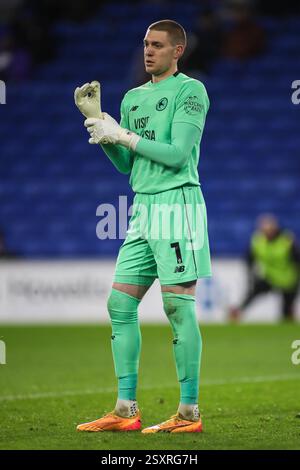Cardiff City goalkeeper Ethan Horvath saves a shot from Marcus Edwards ...