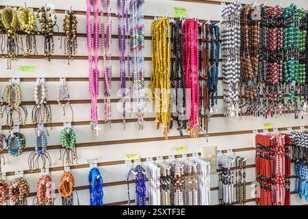 Rosaries for sale in a church cathedral in Rome Italy Stock Photo - Alamy