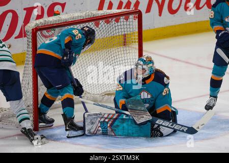New York Sirens goaltender Kayle Osborne (82) watches the puck as ...