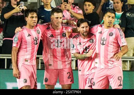 Inter Miami midfielder Tadeo Allende, top, heads the ball over Columbus ...