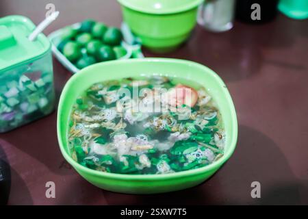 Sop Iga (Beef ribs soup) made from ribs, carrots, leeks. Served in ...