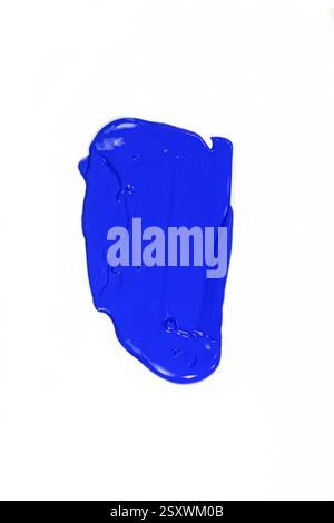 The puddle of blue paint spill isolated on white background Stock Photo ...