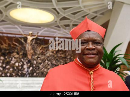 FILE - Cardinal Fridolin Ambongo Besungu poses for photographers at the ...