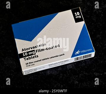 Photograph of a pack of Atorvastatin tablets. 10mg Film-coated tablets ...