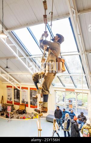 Model exhibit of caver climbing a rope using single rope techniques ...