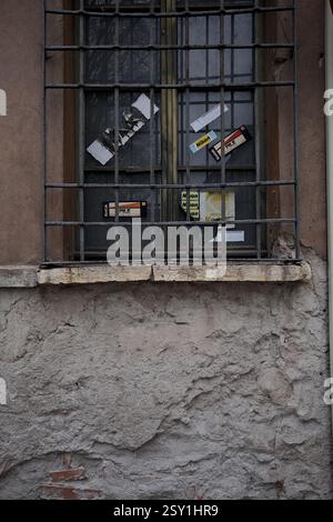 Mantova, Italy - 19TH FEBRUARY 2025 - Old promotional stickers on a ...