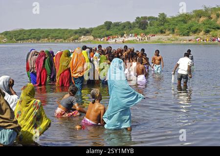 People bathing Beneshwar tribal Fair Dungarpur Rajasthan India Asia ...