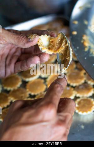 Pili tart making in Bicol, Philippines, showcasing a popular local ...