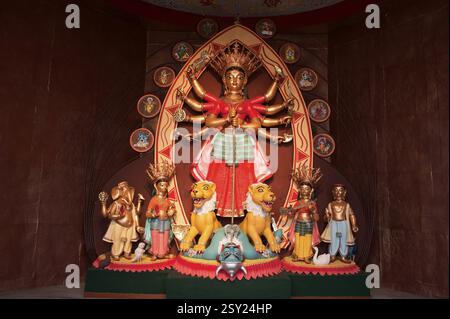 Goddess durga killing demon mahishasura with goddesses laxmi saraswati ...