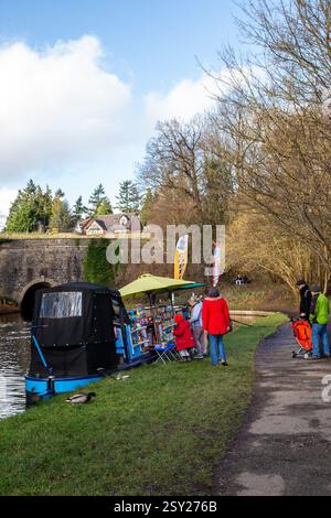 Canal narrowboat selling fresh coffee and sweets for children on the Llangollen canal at Chirk ...