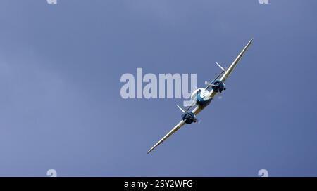 Vintage Lockheed 12A Electra Junior in flight Stock Photo - Alamy