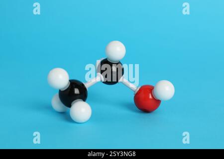 Molecule of ethanol on light blue background. Chemical model Stock ...