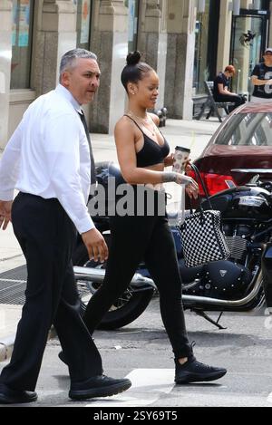 Singer Rihanna wears a sports bra and yoga pants as she leaves her Soho ...