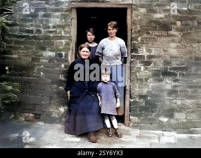 Poor working class women mother, daughters and grand daughter in slum ...