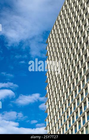 Modern Office Building Facade with Repetitive Windows and Stone ...