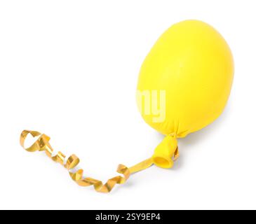 One yellow half deflated balloon isolated on white Stock Photo - Alamy