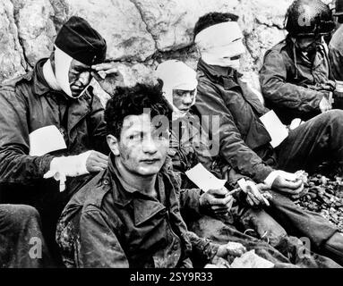 Soldiers of the 16th Infantry Regiment, wounded while storming Omaha ...