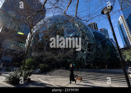 The sun rises over the Amazon Spheres at Amazon Headquarters in Seattle ...