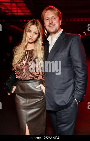 Simona Jakstaite and Christopher Aleo attend the premiere of 'Jay Kelly ...