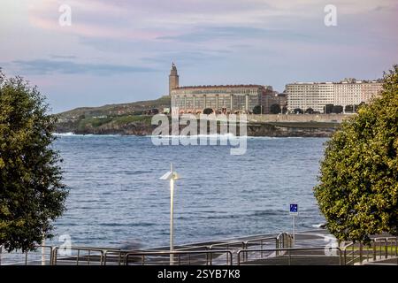 Riazor beach bay in the Spanish city of A Coruña and the Hercules tower ...