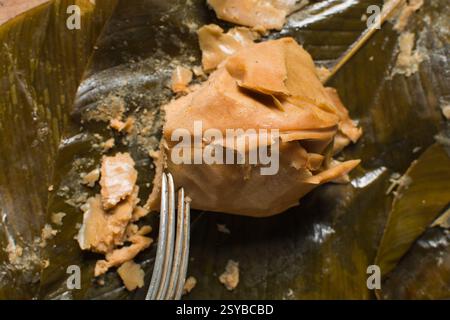 Overhead of moi moi in leaf on a plate, top view of nigerian bean ...