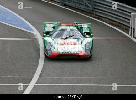 Gary Culver, in his Green, 1967, Lola T70 Mk3, exiting the pit lane, to ...