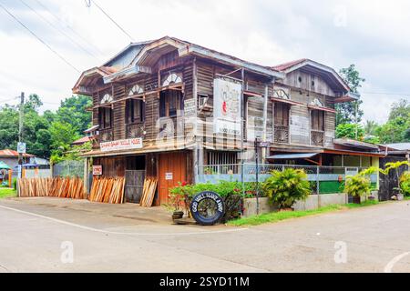 A traditional thatched house in the Philippines made almost entirely of ...