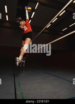 Aerial volleyball practice indoors with off camera flash Stock Photo ...