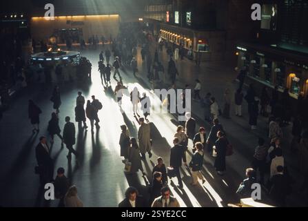 Morning commuters pass the New York Stock Exchange, Tuesday, Jan. 20 ...