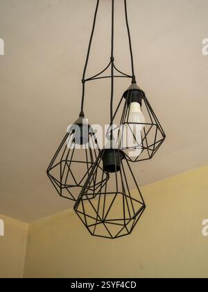 Three platforms chandelier. Lighting fixture. There are not enough ...