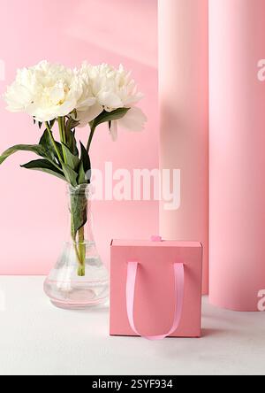 Postcard with gift boxes, hearts and roses on wooden background ...