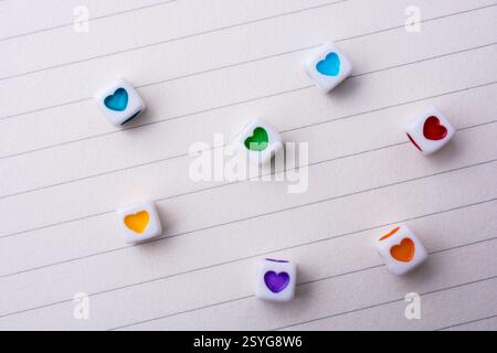 Colorful cubes with a heart placed on paper Stock Photo - Alamy